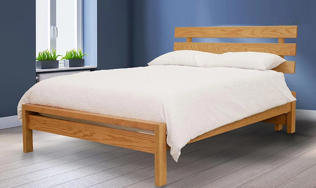 solid pine or oak bed handmade in the UK for green woods furniture